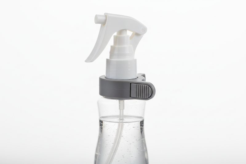 What is the function of the clip lock mechanism on a fine mist spray b ...